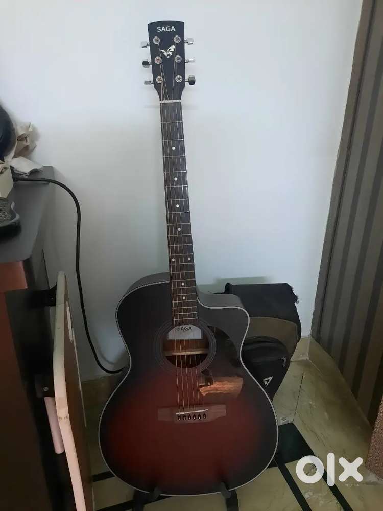 Saga SF-600C Acoustic Guitar With Padded Bag and Tuner - Musical ...