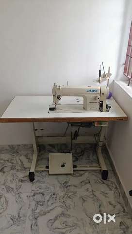 Sewing machine with table olx store