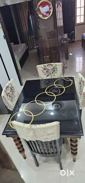 4 seater dining table olx store