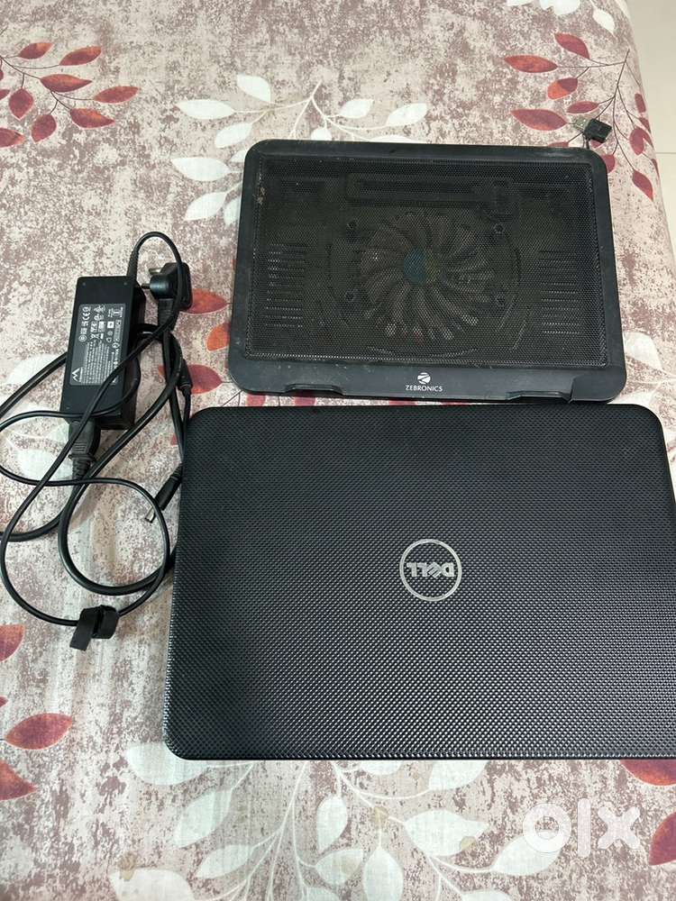Dell Laptop with black charger n cooling pad - Computer Accessories in ...