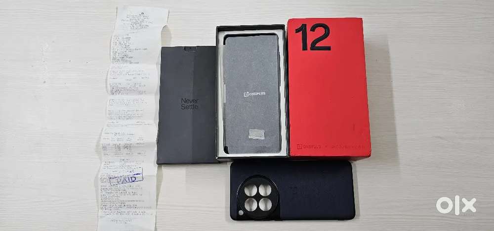 One Plus 12, 12/256 GB Silky Black 1 month old indian purchased ...