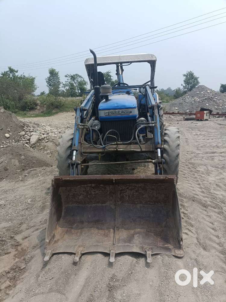 Sonalika tractor 755 4*4 with attached front loader and back hoe ...