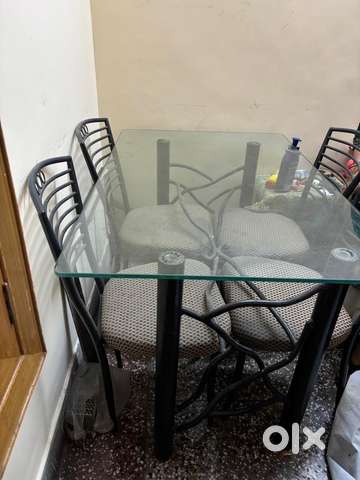 Olx glass dining table store