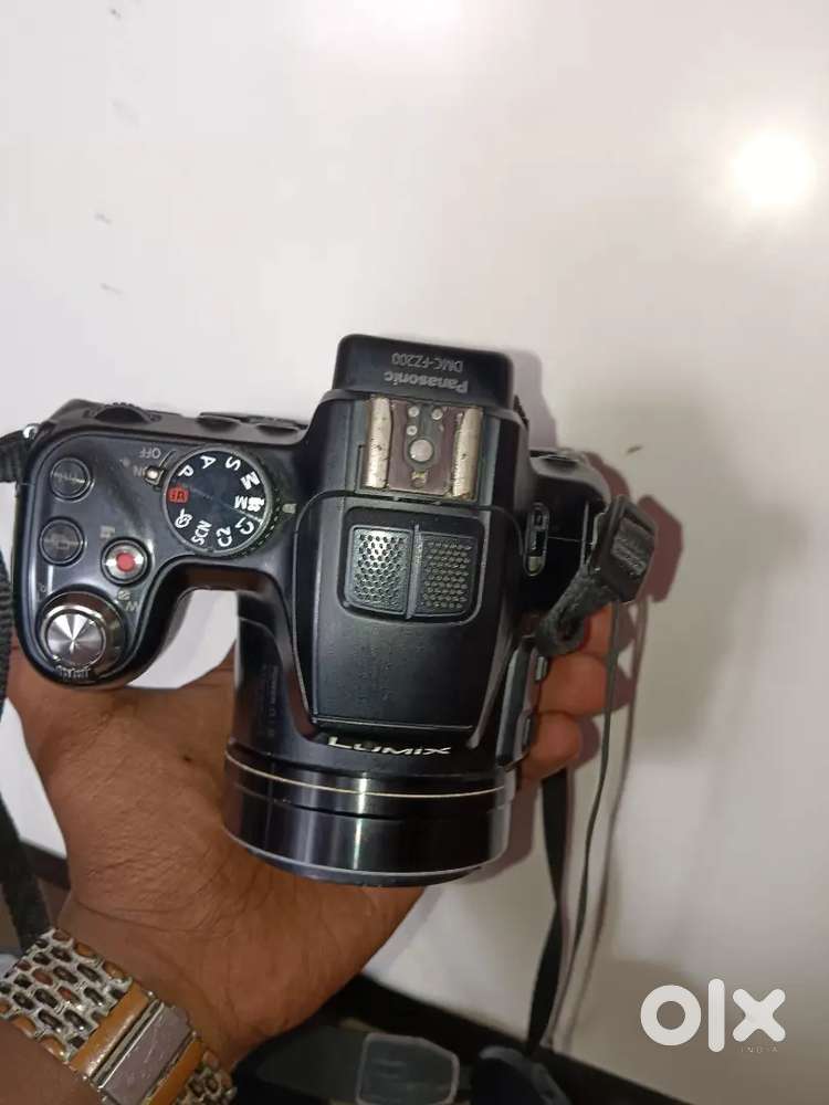 Slr Lumix camera with 25mm - 600mm inbuilt lense which gives 120x zoom ...