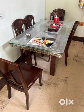 Olx dining table 6 seater store