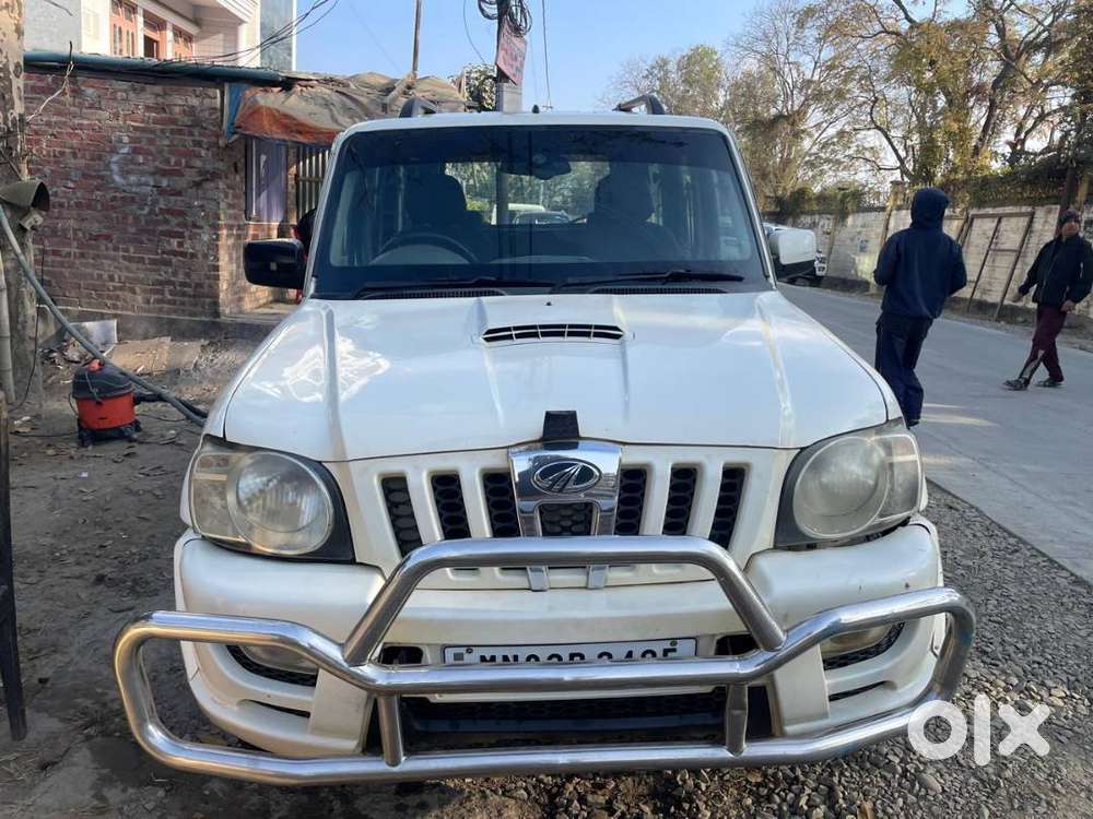 Bid old but still strong - Cars in Porompat, Imphal - 1833426146